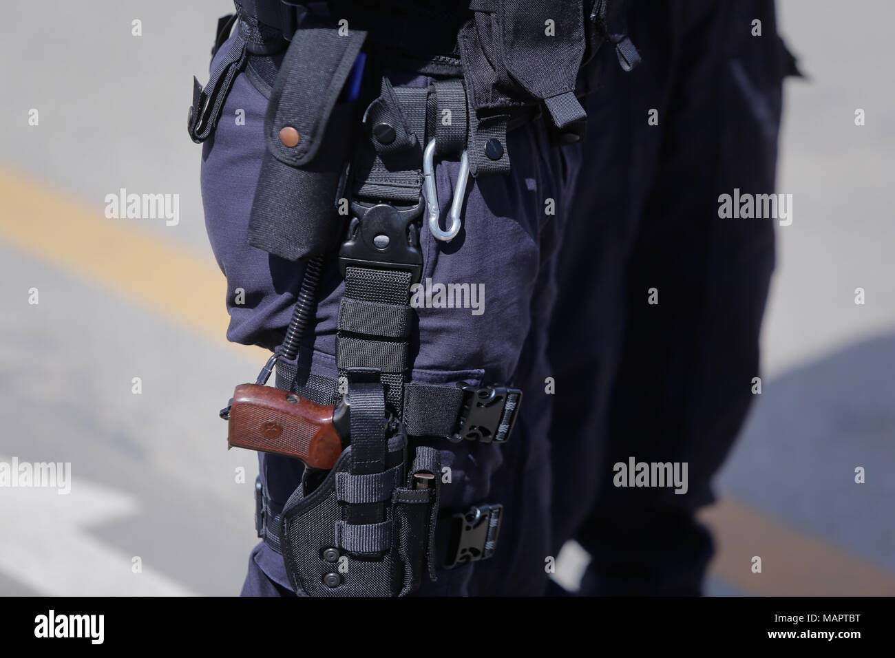 Police officer pistol hi-res stock photography and images - Alamy
