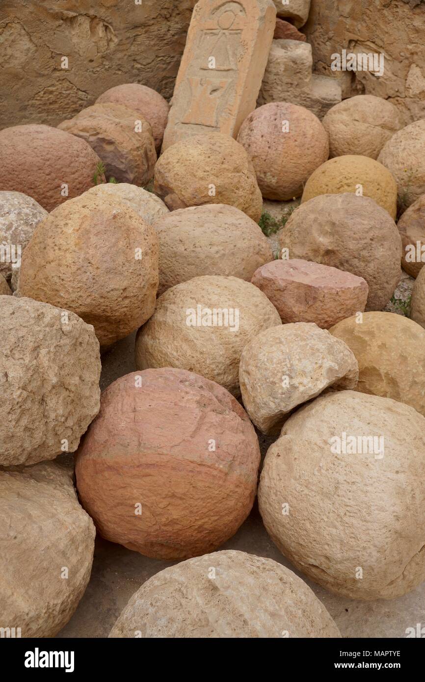 Stone cannon balls of Borj El Kabir in Djerba Stock Photo - Alamy