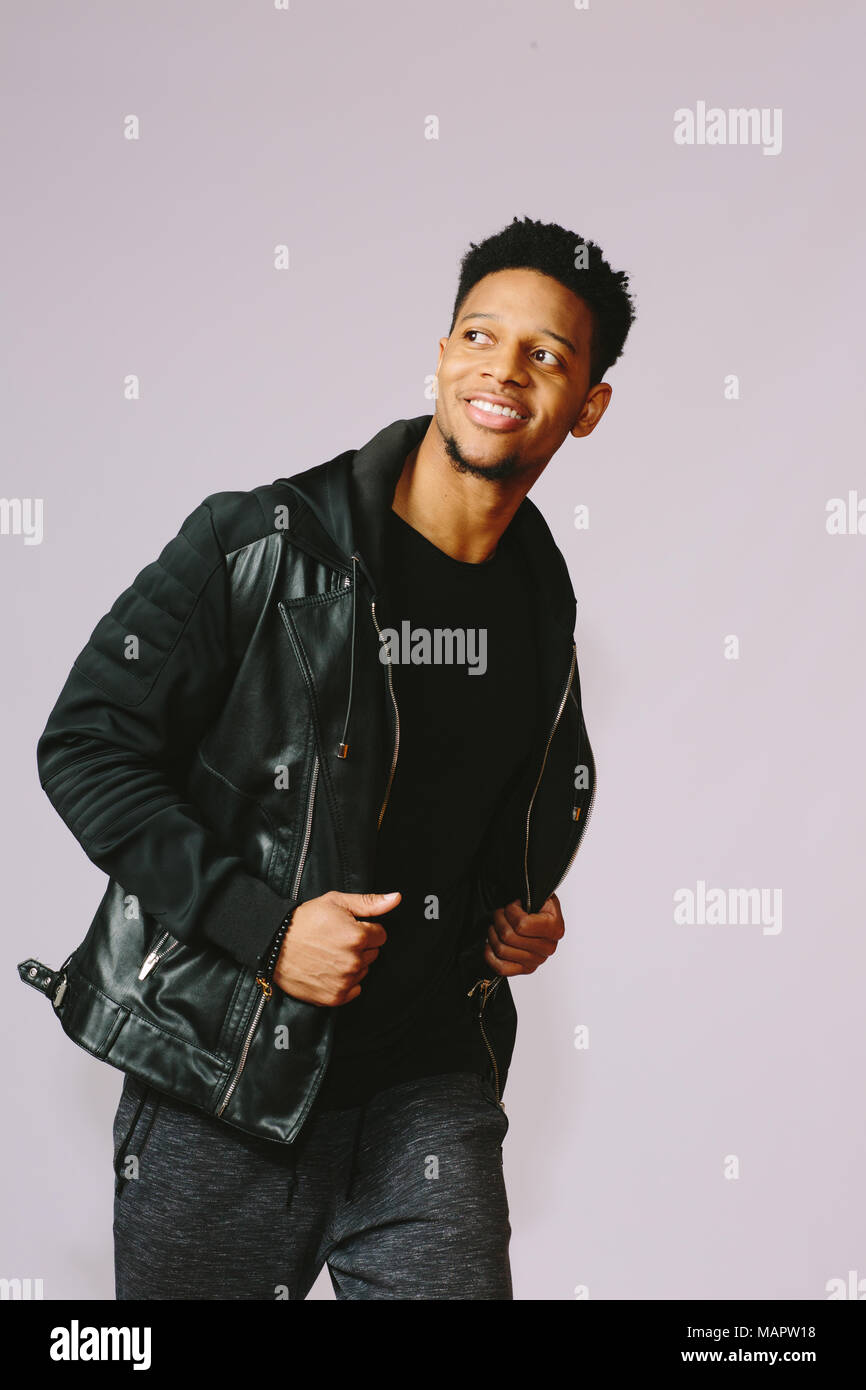 Portrait of a cool young man, isolated on studio background Stock Photo ...