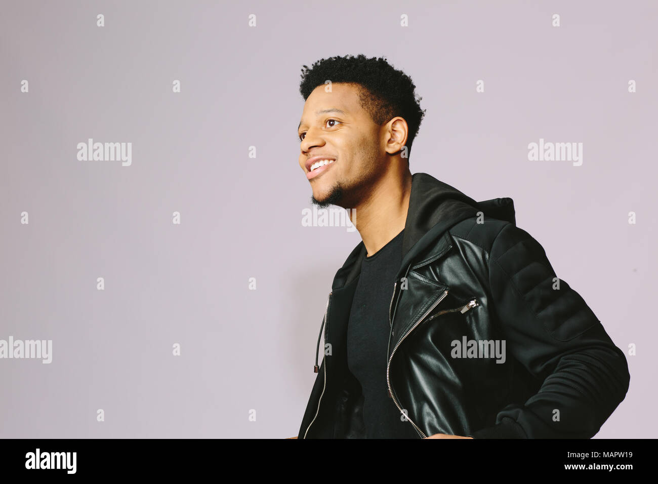 Portrait of a cool young man, isolated on studio background Stock Photo ...