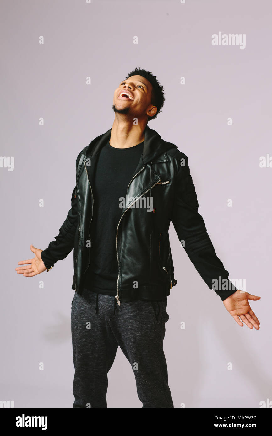 Portrait of a cool young man, isolated on studio background Stock Photo ...