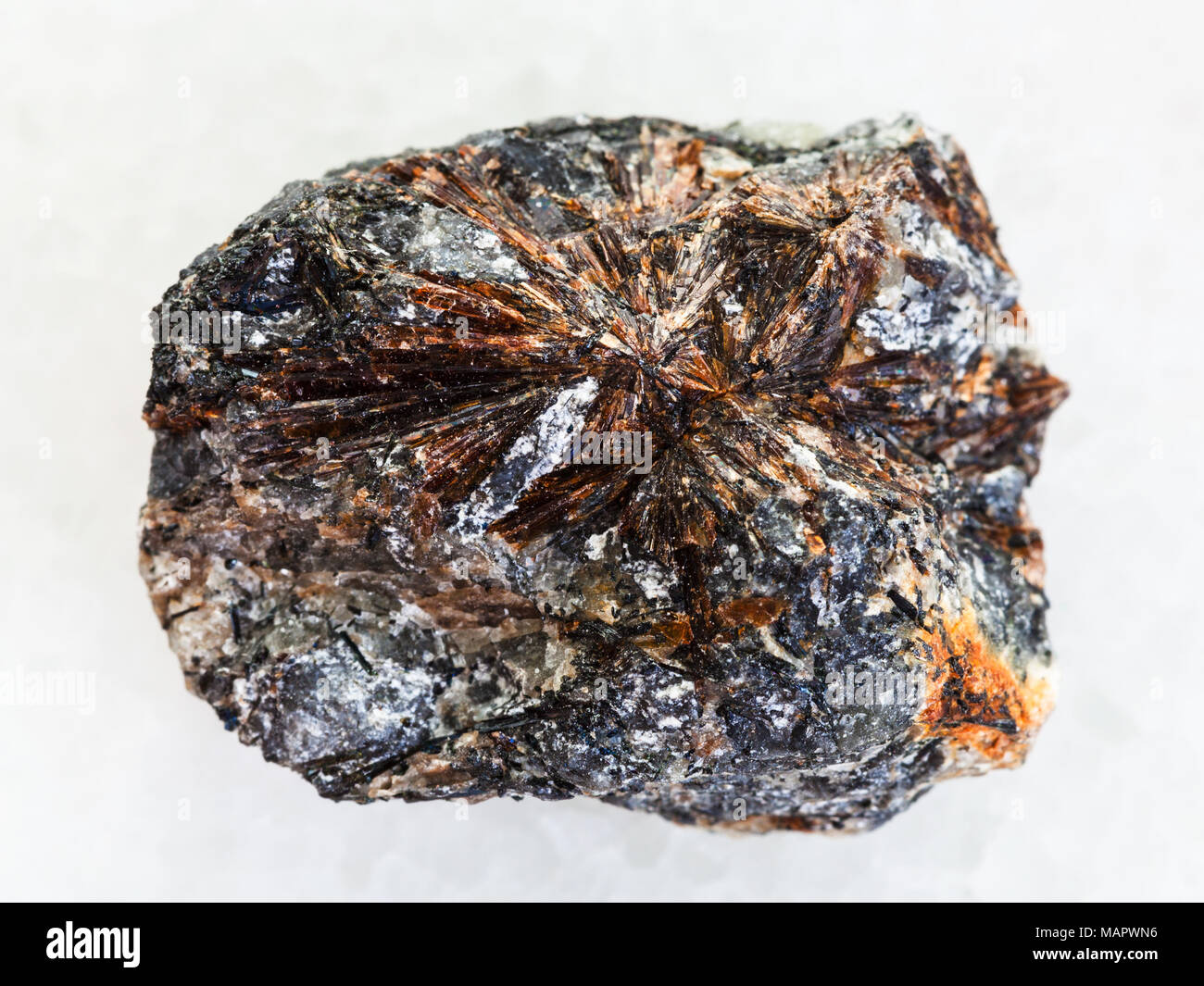 macro shooting of natural mineral rock specimen - raw lamprophyllite ...