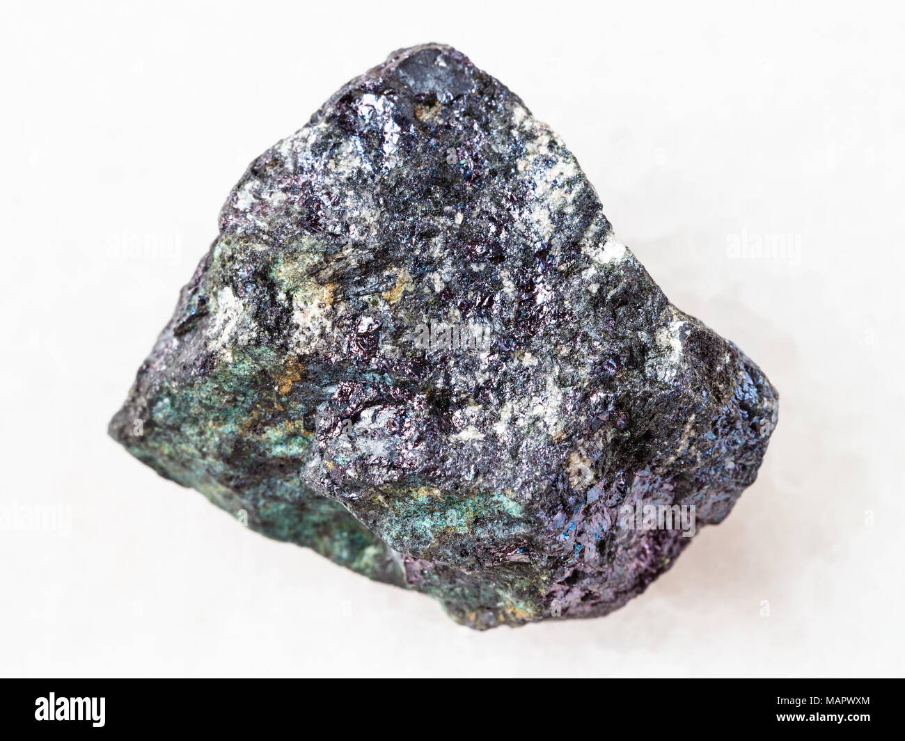 macro shooting of natural mineral rock specimen - bornite stone on ...