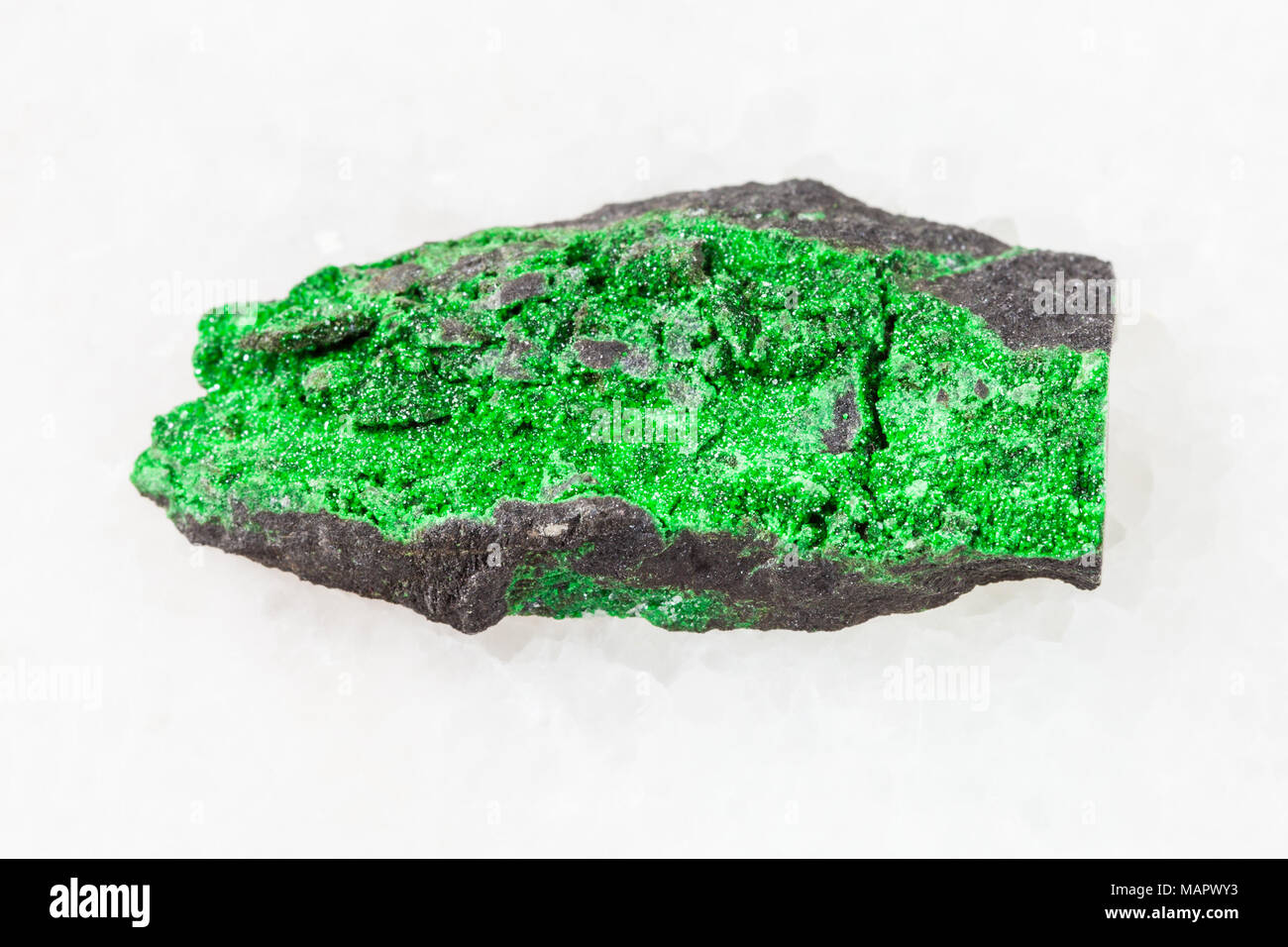 macro shooting of natural mineral stone specimen - green Uvarovite ...