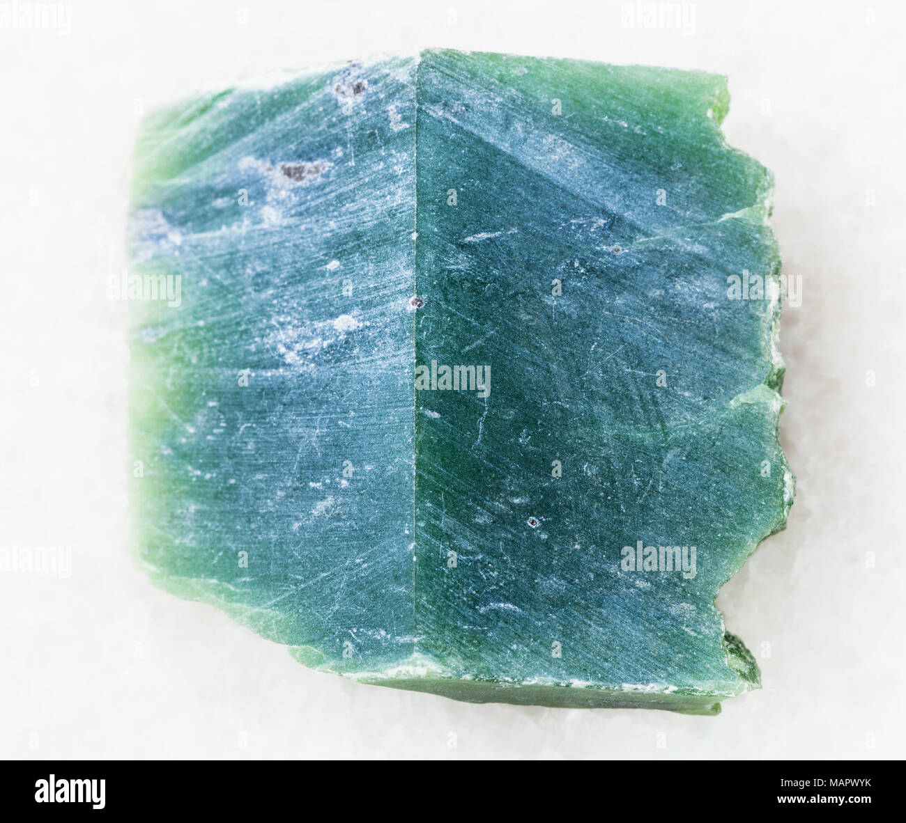 macro shooting of natural mineral rock specimen - rough nephrite stone ...