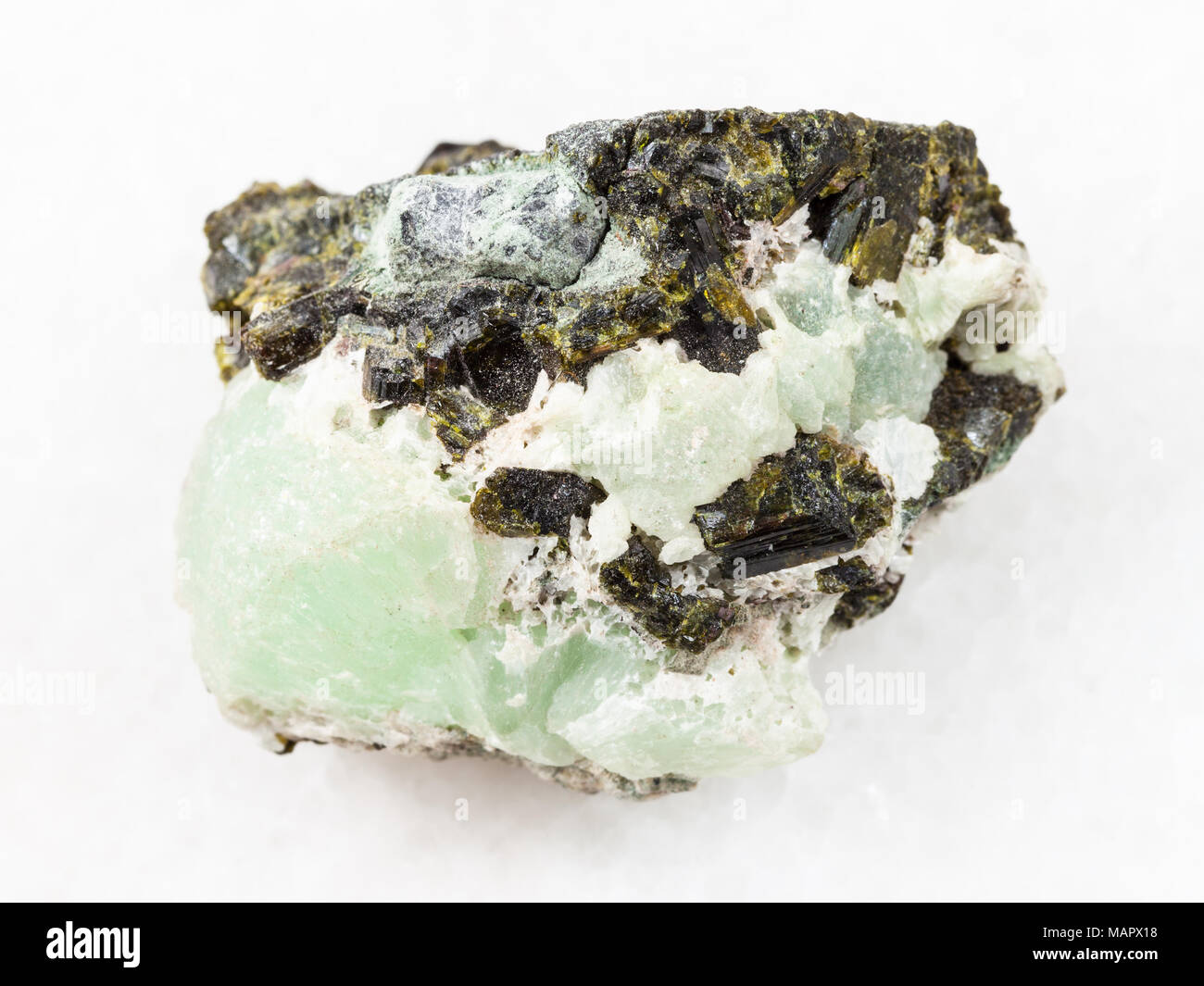 macro shooting of natural mineral stone specimen - Epidote crystals on ...