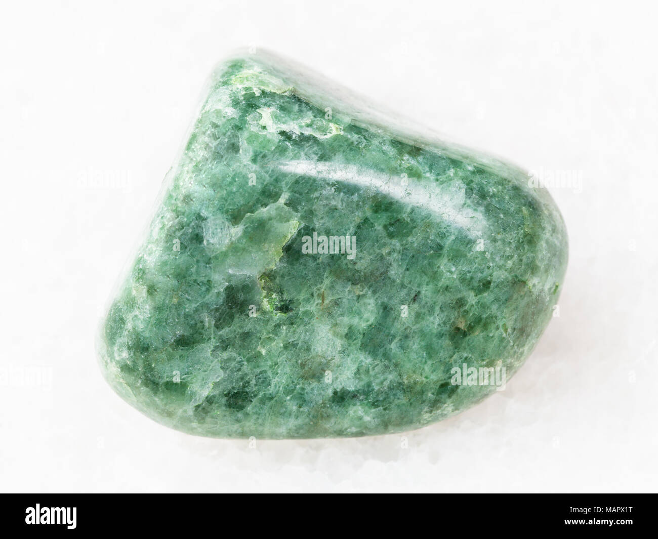 macro shooting of natural mineral rock specimen - polished green ...
