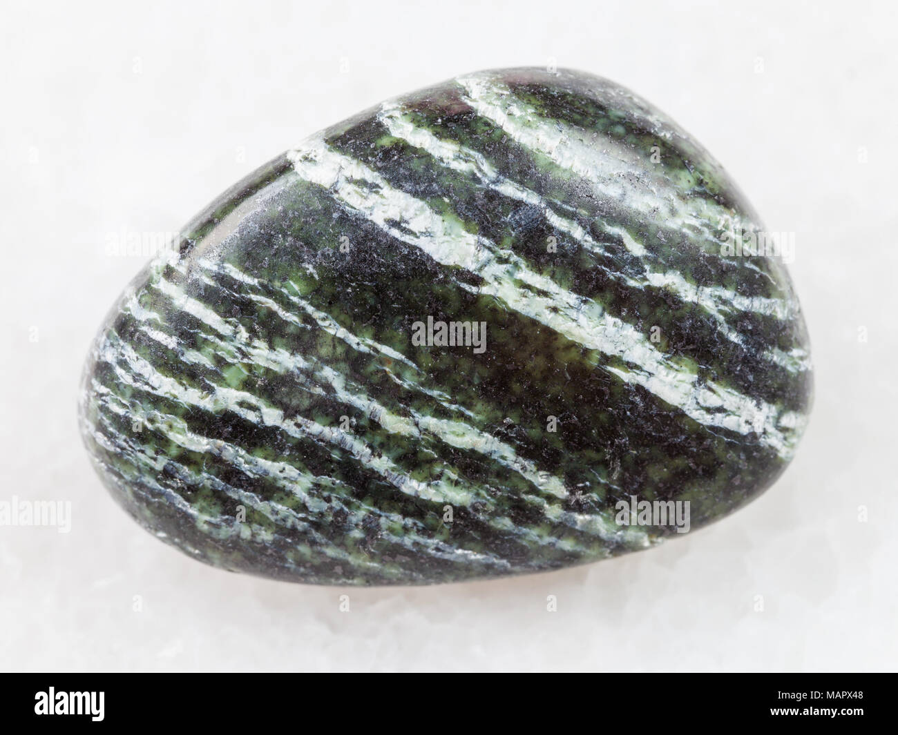 macro shooting of natural mineral rock specimen - polished Chrysotile ...