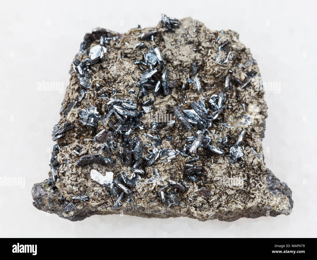 macro shooting of natural mineral rock specimen - magnetite crystals on ...