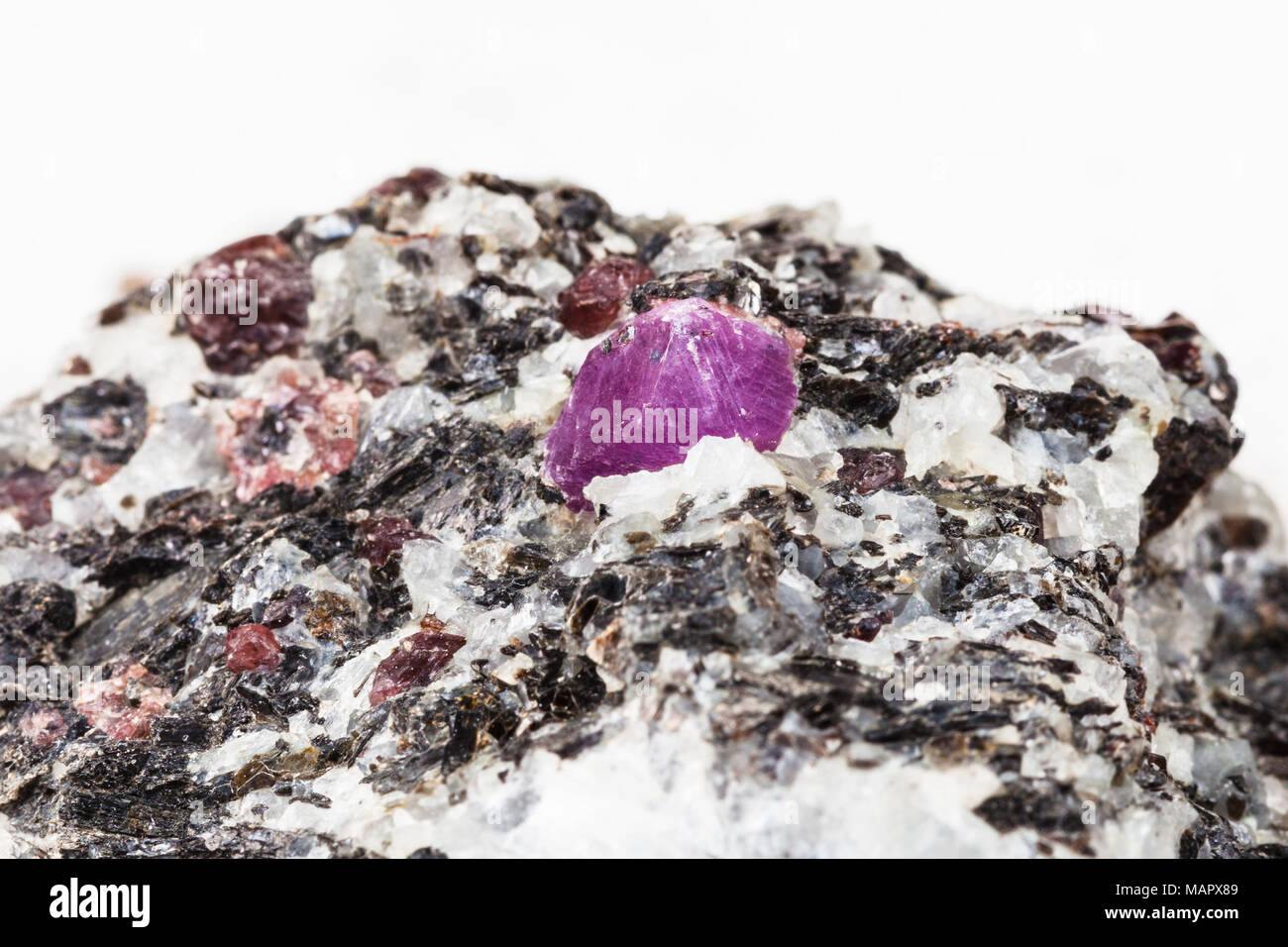 macro shooting of natural mineral rock specimen - corundum crystal in ...