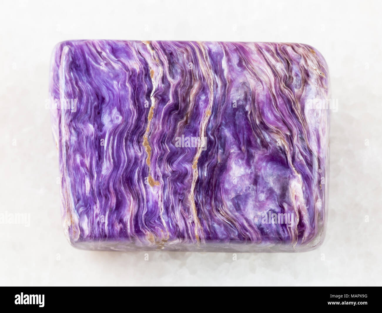 macro shooting of natural mineral rock specimen - tumbled slab of ...