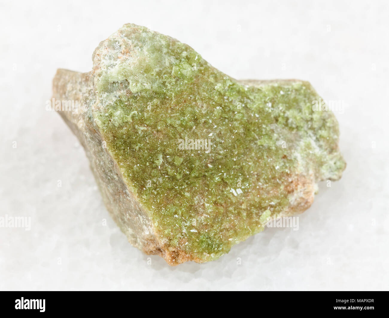 macro shooting of natural mineral rock specimen - green Vesuvianite ...