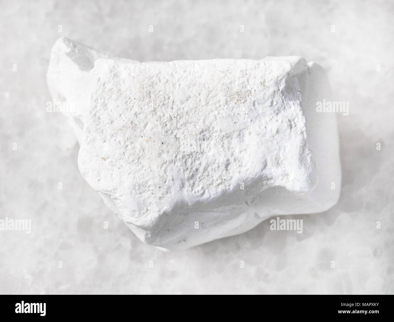 macro shooting of natural mineral rock specimen - chalk stone on white ...