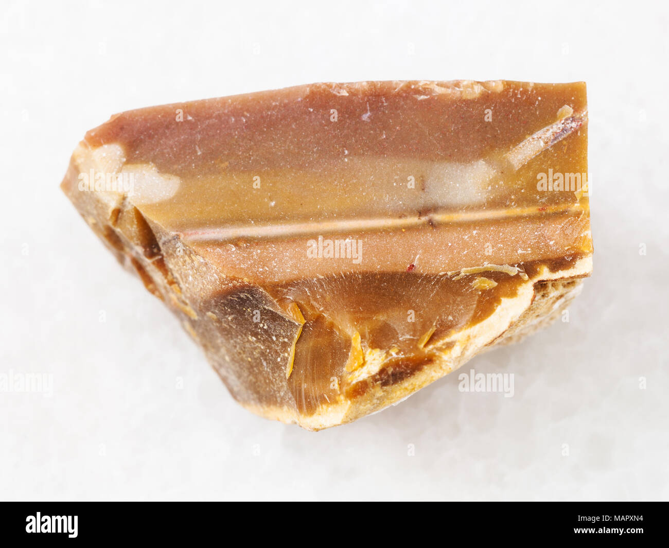 macro shooting of natural mineral rock specimen - brown Flint stone on ...