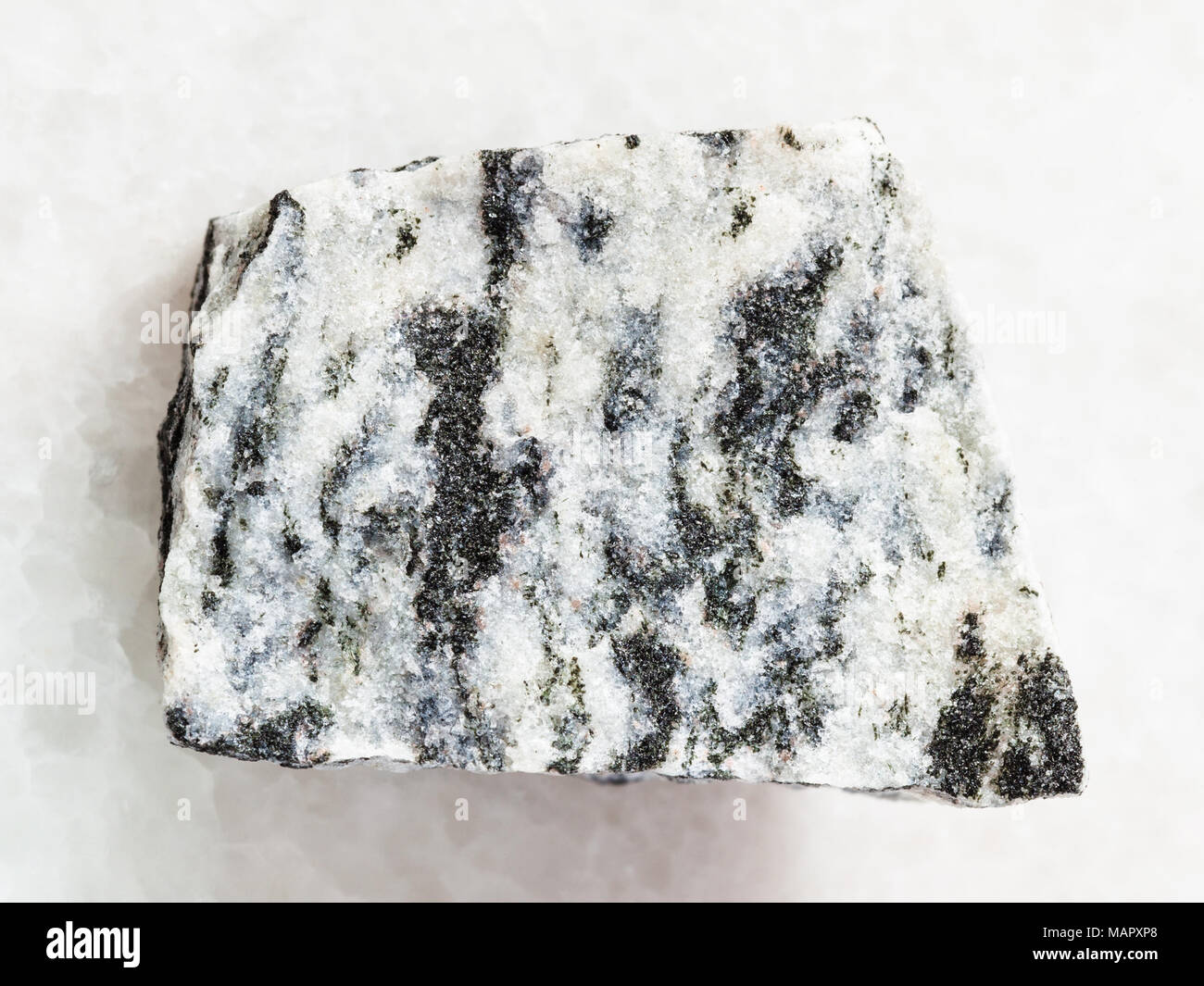 macro shooting of natural mineral rock specimen - rough migmatite stone ...