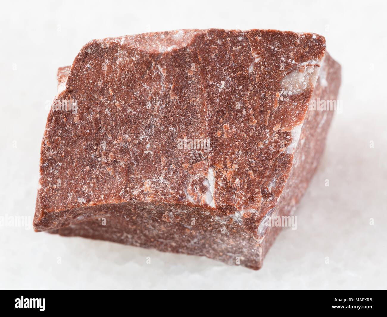 macro shooting of natural mineral rock specimen - piece of rough red ...