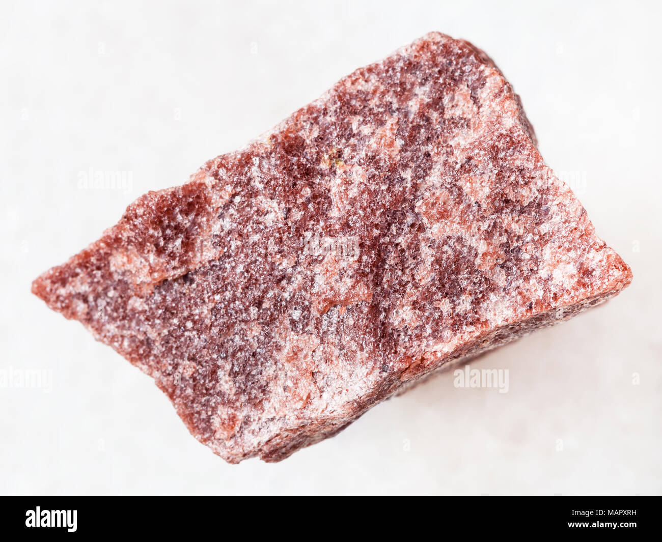 macro shooting of natural mineral rock specimen - rough pink Quartzite ...