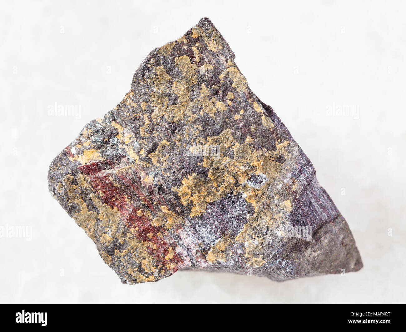 macro shooting of natural mineral rock specimen - raw jaspilite ...