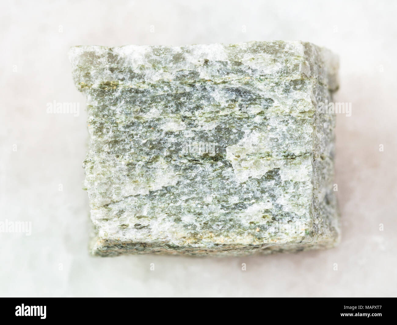 macro shooting of natural mineral rock specimen - quartz-mica schist ...