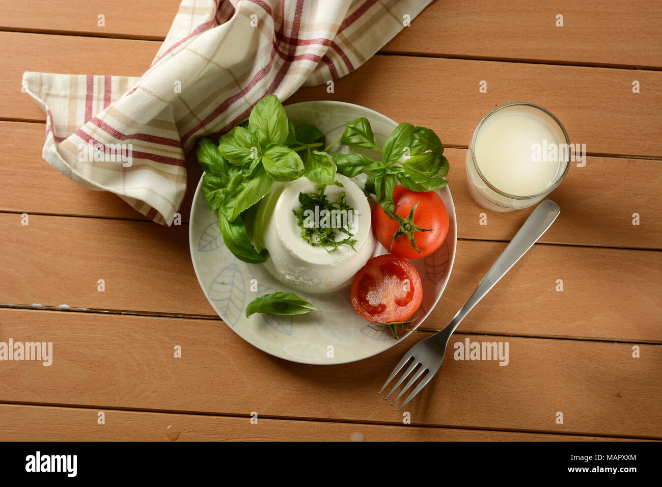 ricotta cheese with basil and tomatoes - traditional Italian dairy ...