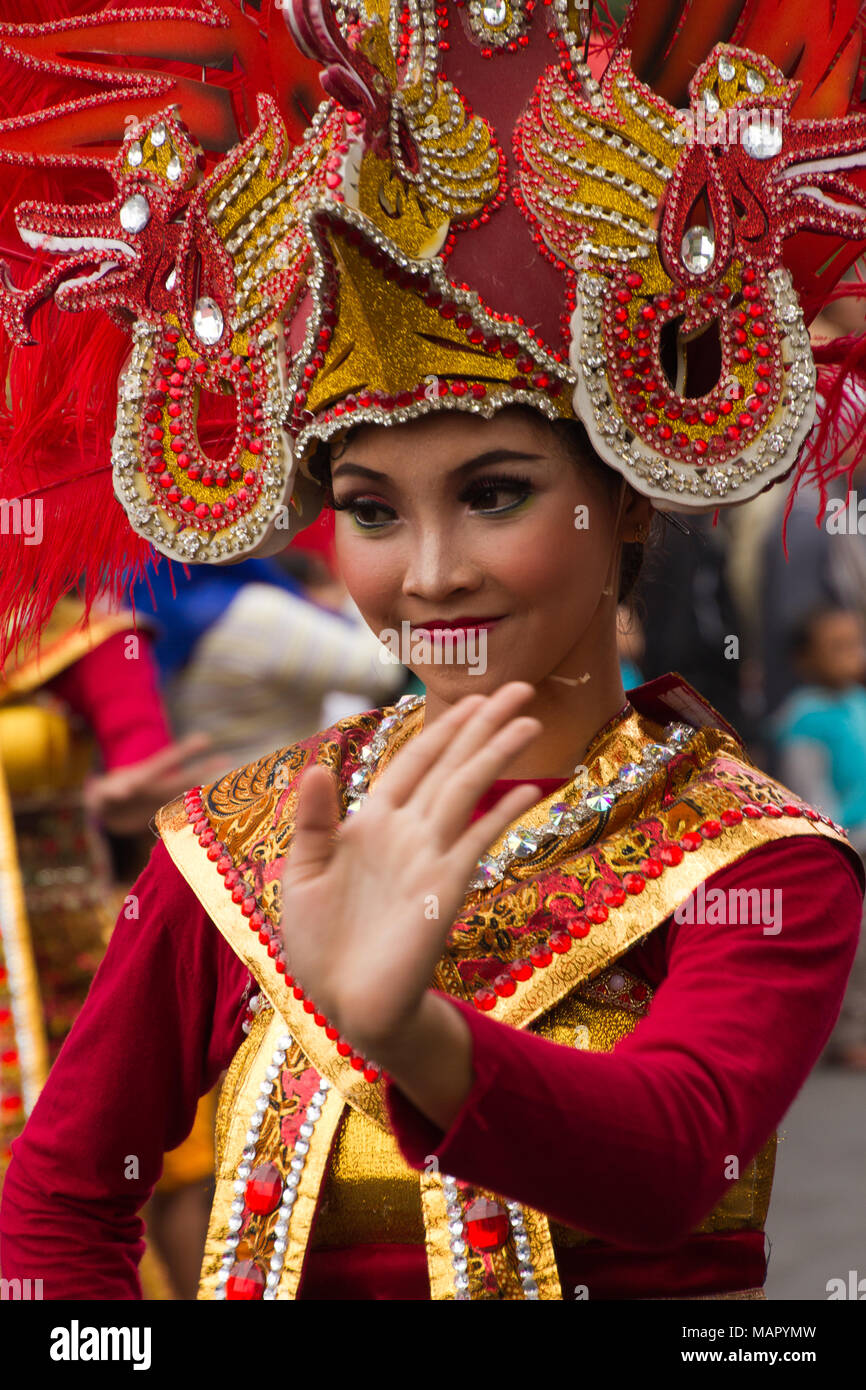 Indonesian woman taking part in a carnival celebrating Malang's 101st ...