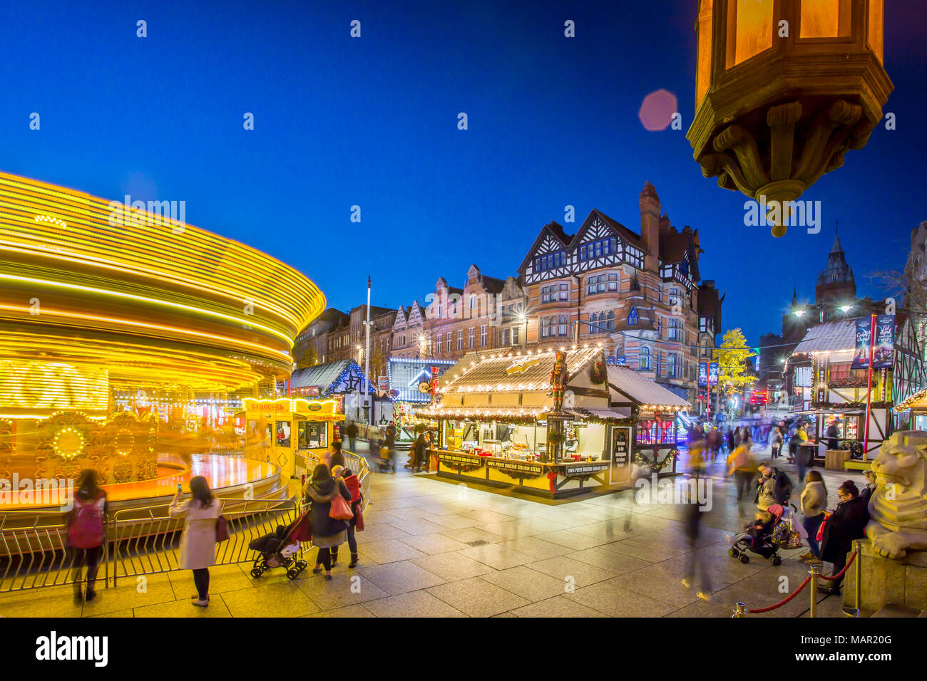 Christmas Market, Carousel and lamp on Old Market Square at dusk ...