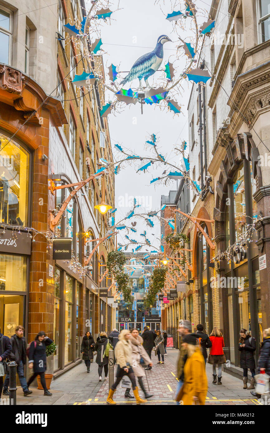 Christmas decorations in Slingsby Place, London, England, United ...