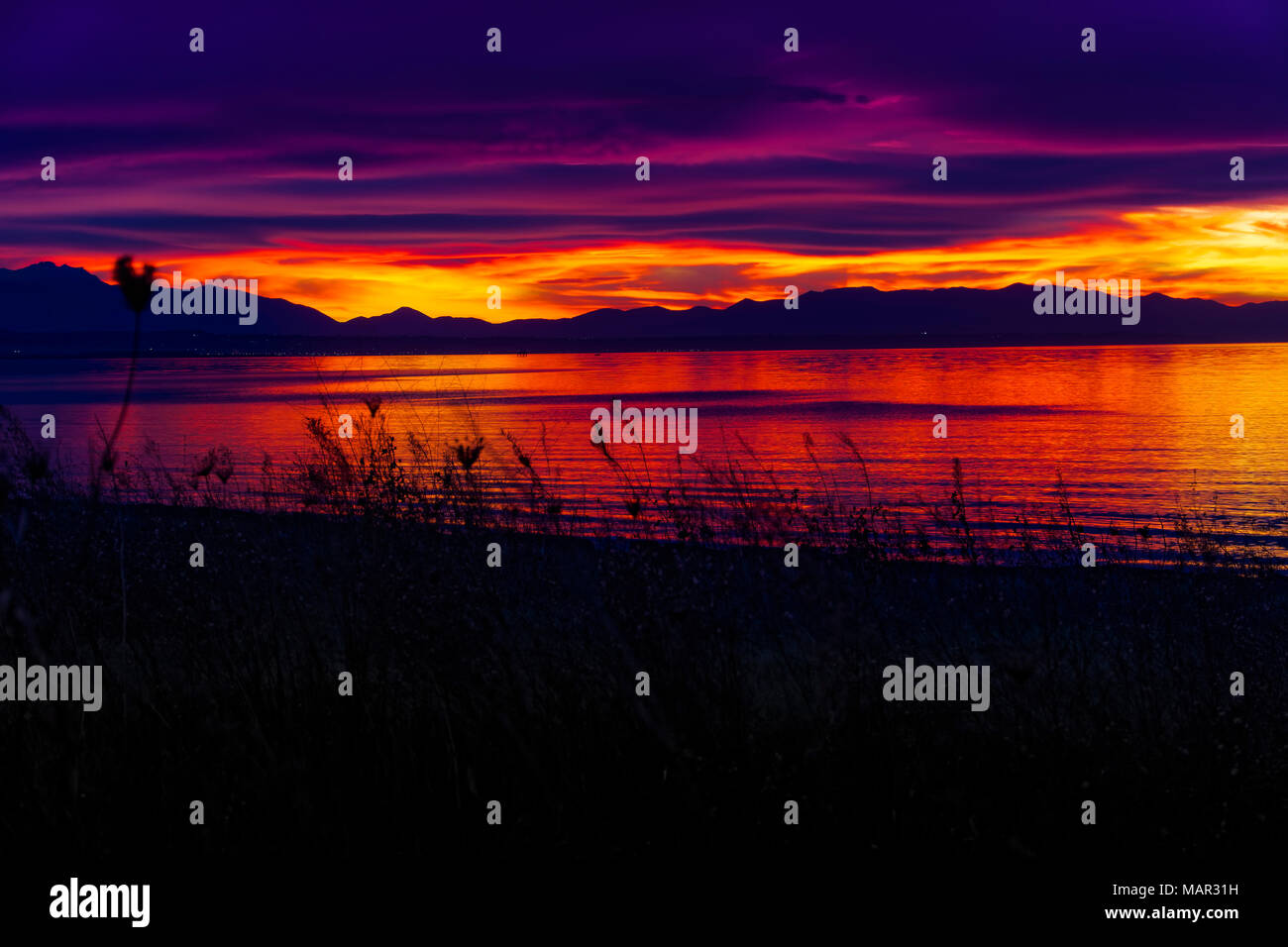 Purple sunset over sea on hi-res stock photography and images - Alamy