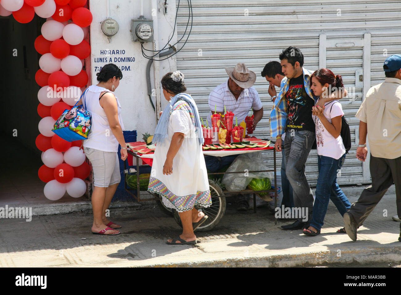 MERIDA, MEXICO - march 11, 2012: Man from Merida selling fresh fruit ...