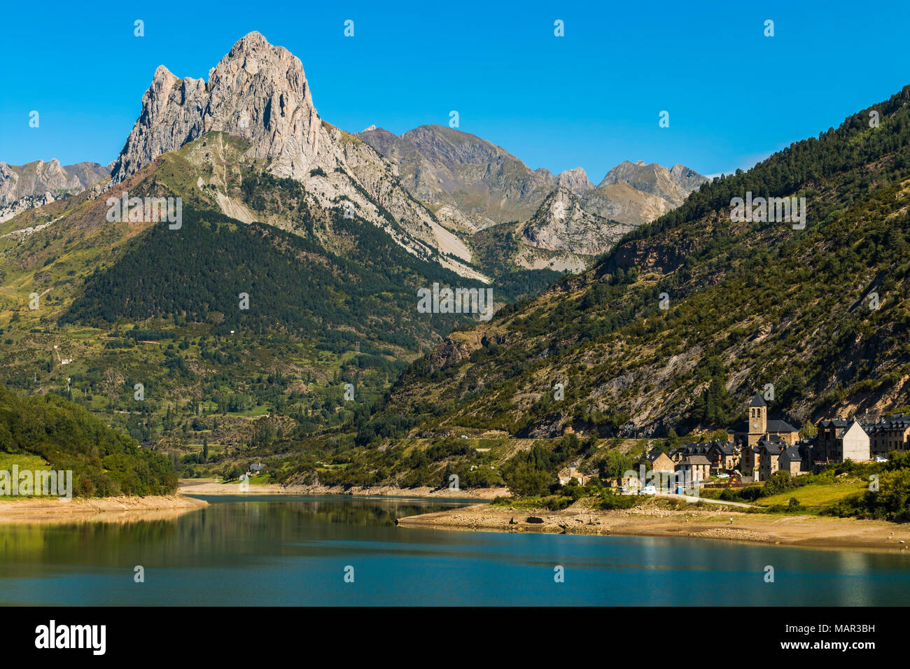 Lanuza lake and village and Pena Foratata peak in the scenic upper Tena ...