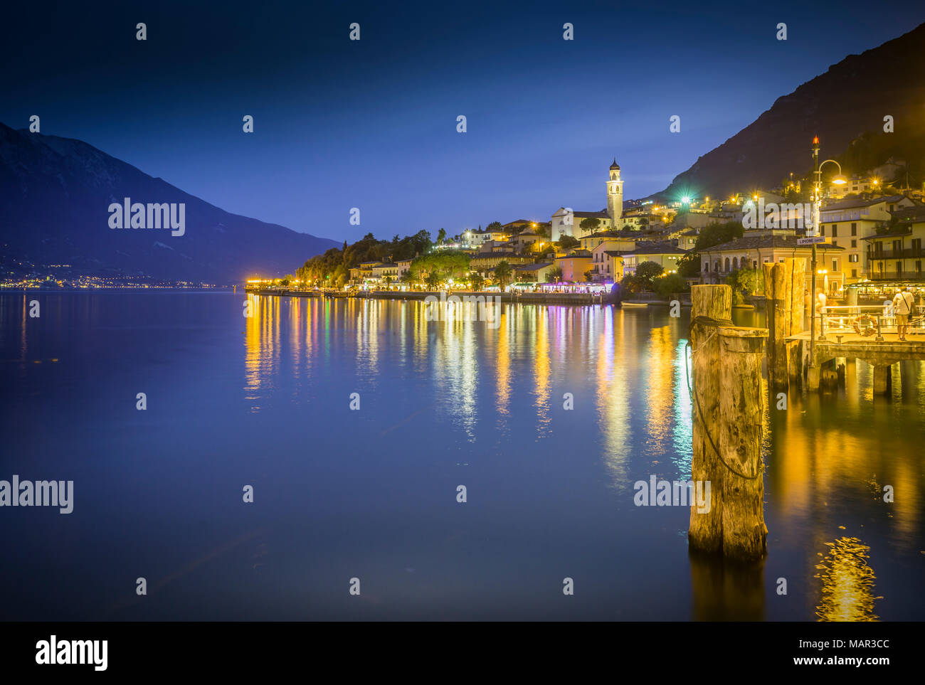 Panoramic view of Lake Garda and the port of Limone at dusk, Lake Garda ...