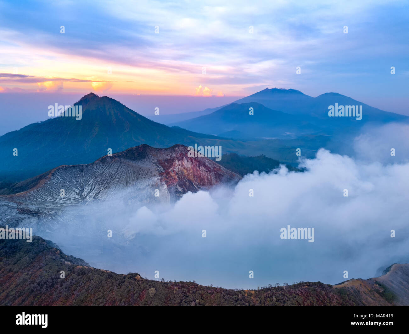 Indonesia. The island of Java. Dawn over the volcanoes. The active ...
