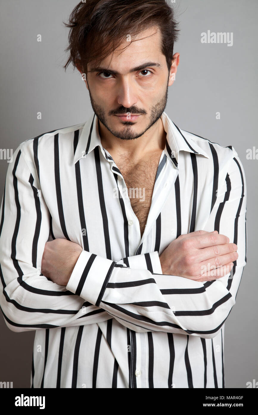 Man in Striped Shirt Stock Photo - Alamy
