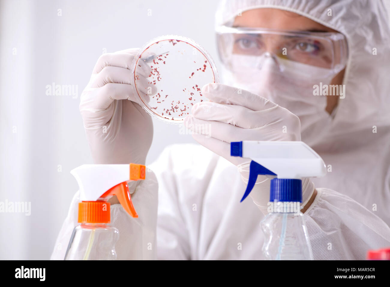 Chemist testing chemical substances in lab Stock Photo - Alamy