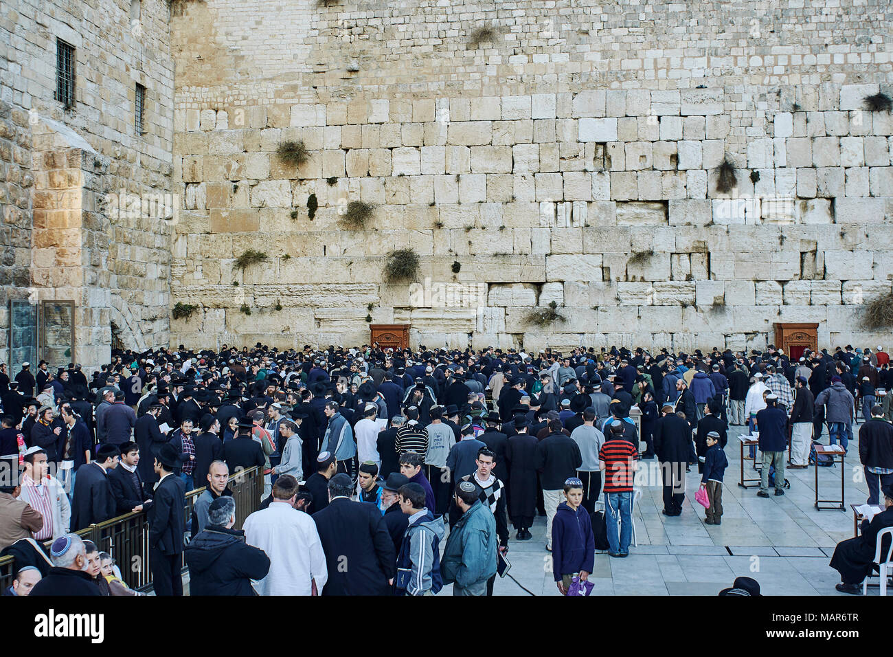 crowd in front of the western or wailing wall of temple mount in ...