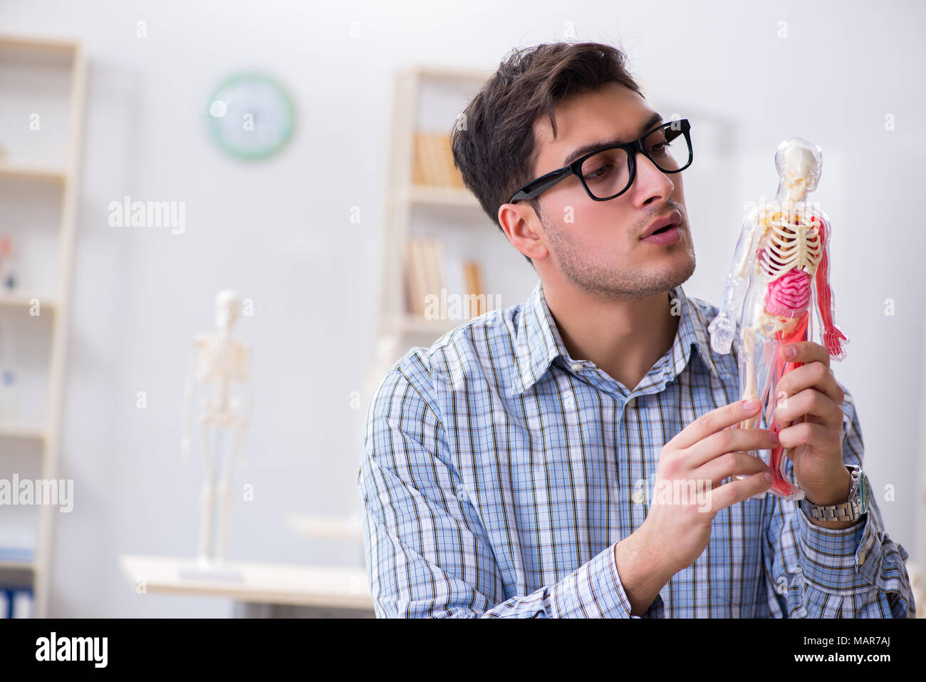 Medical student studying in classroom Stock Photo - Alamy