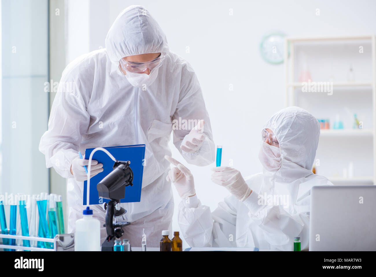 Two scientists working in the chemical lab Stock Photo - Alamy