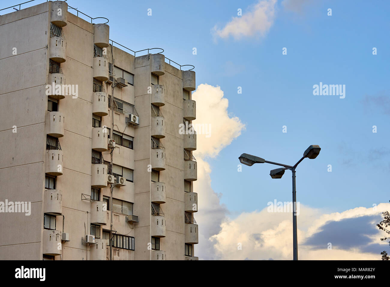 an old apartment building against a blue sky in haifa, israel Stock ...