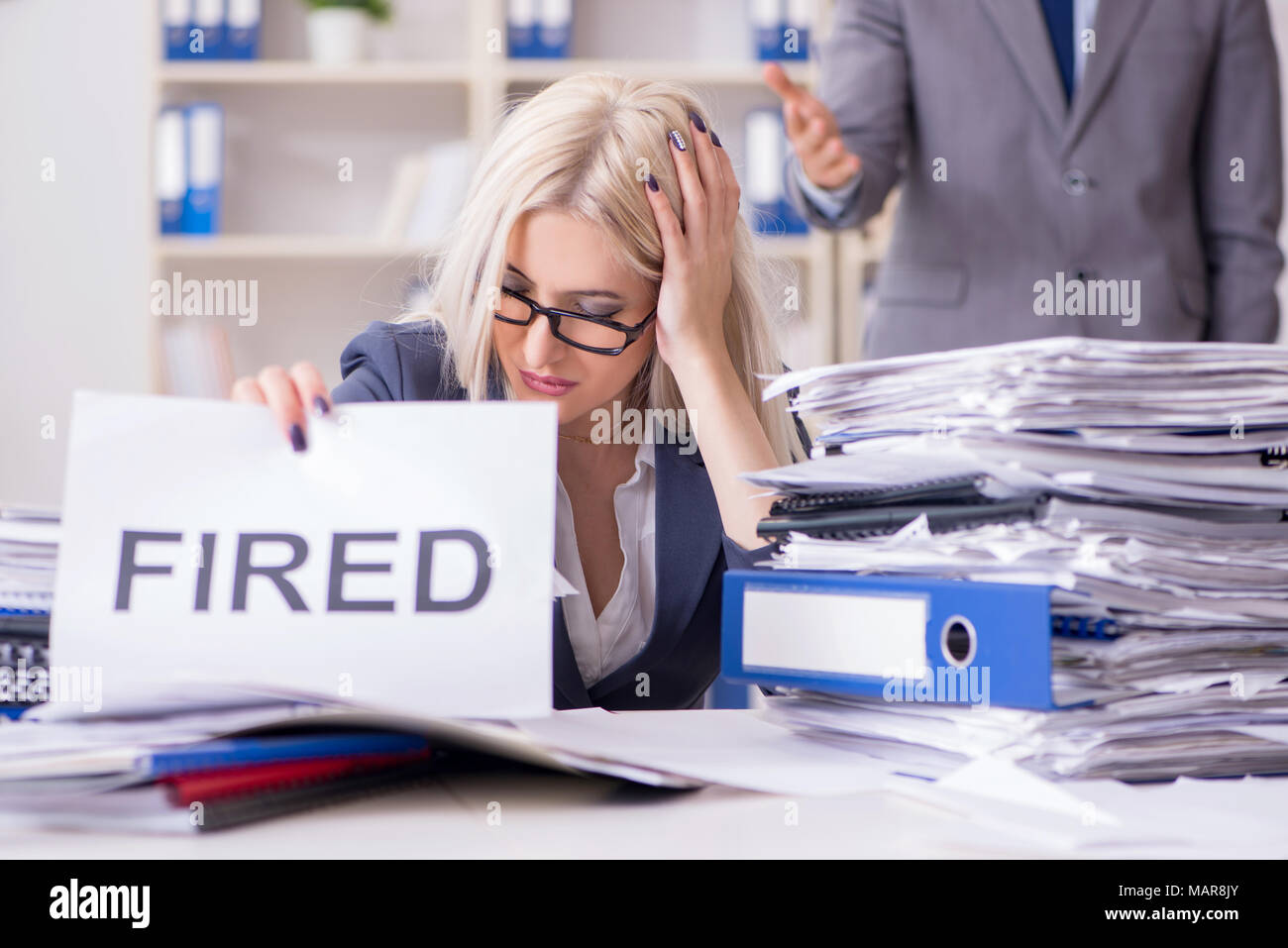 Angry boss firing his assistant secretary Stock Photo - Alamy