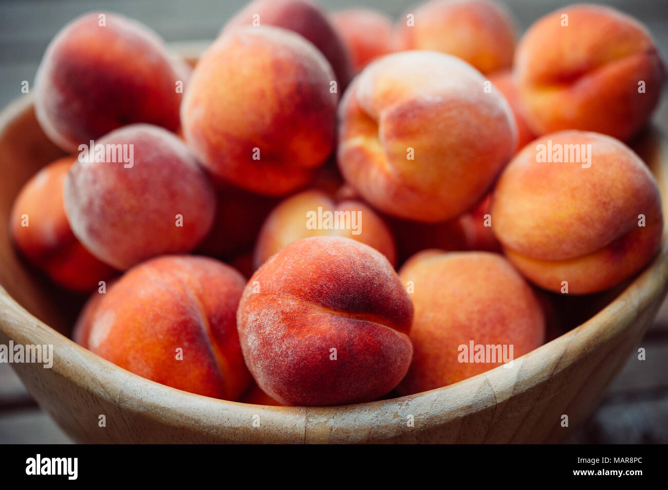Peaches in fruit bowl hi-res stock photography and images - Alamy