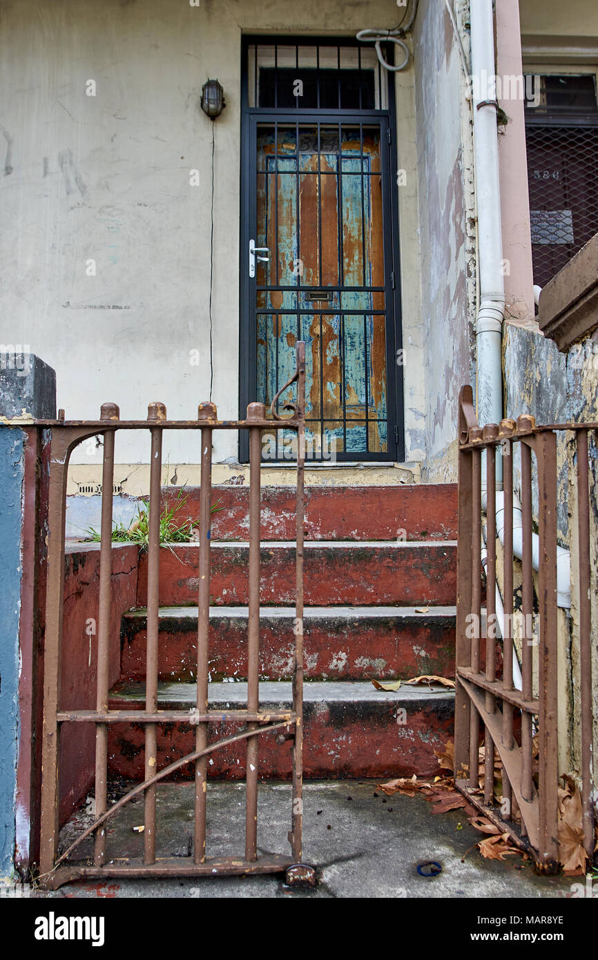 front facia, gate and door of old inner city workers cottage Stock ...