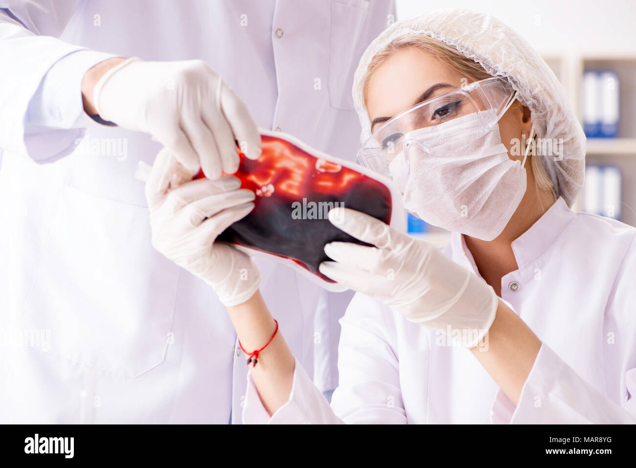 Young female woman doctor in hospital clinic lab Stock Photo - Alamy