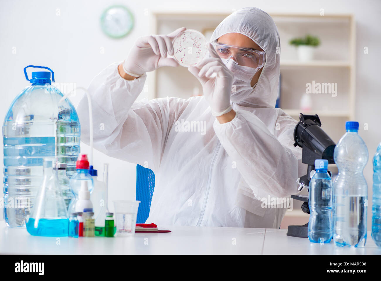 Lab assistant testing water quality Stock Photo - Alamy