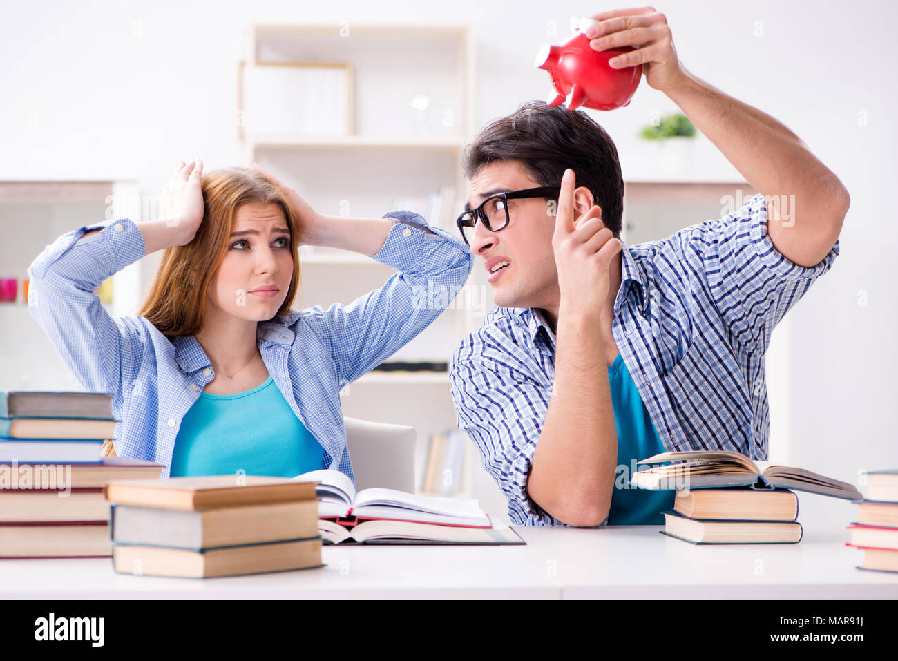 Checking out book library hi-res stock photography and images - Alamy