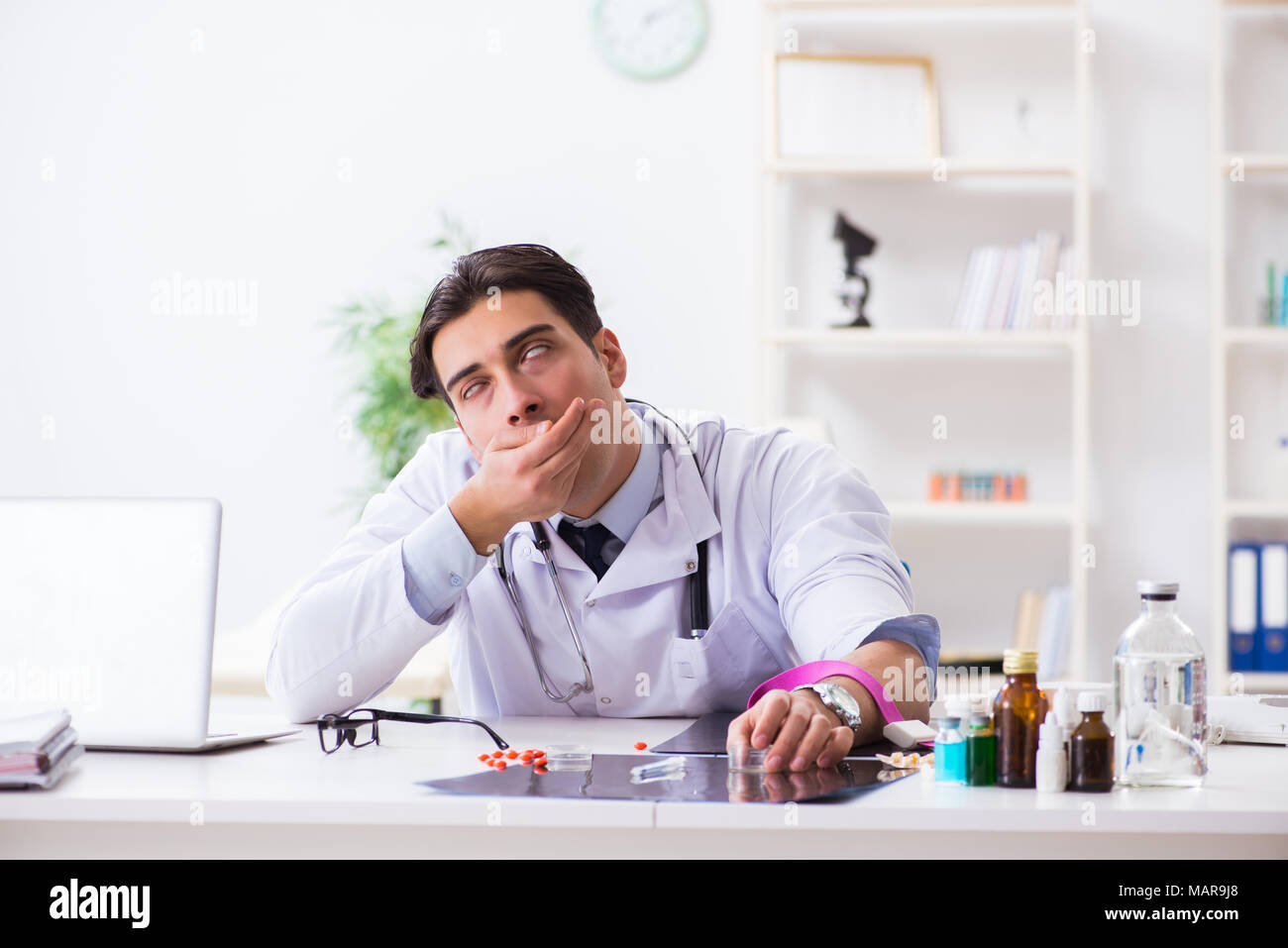 Doctor drug addict in the hospital Stock Photo - Alamy