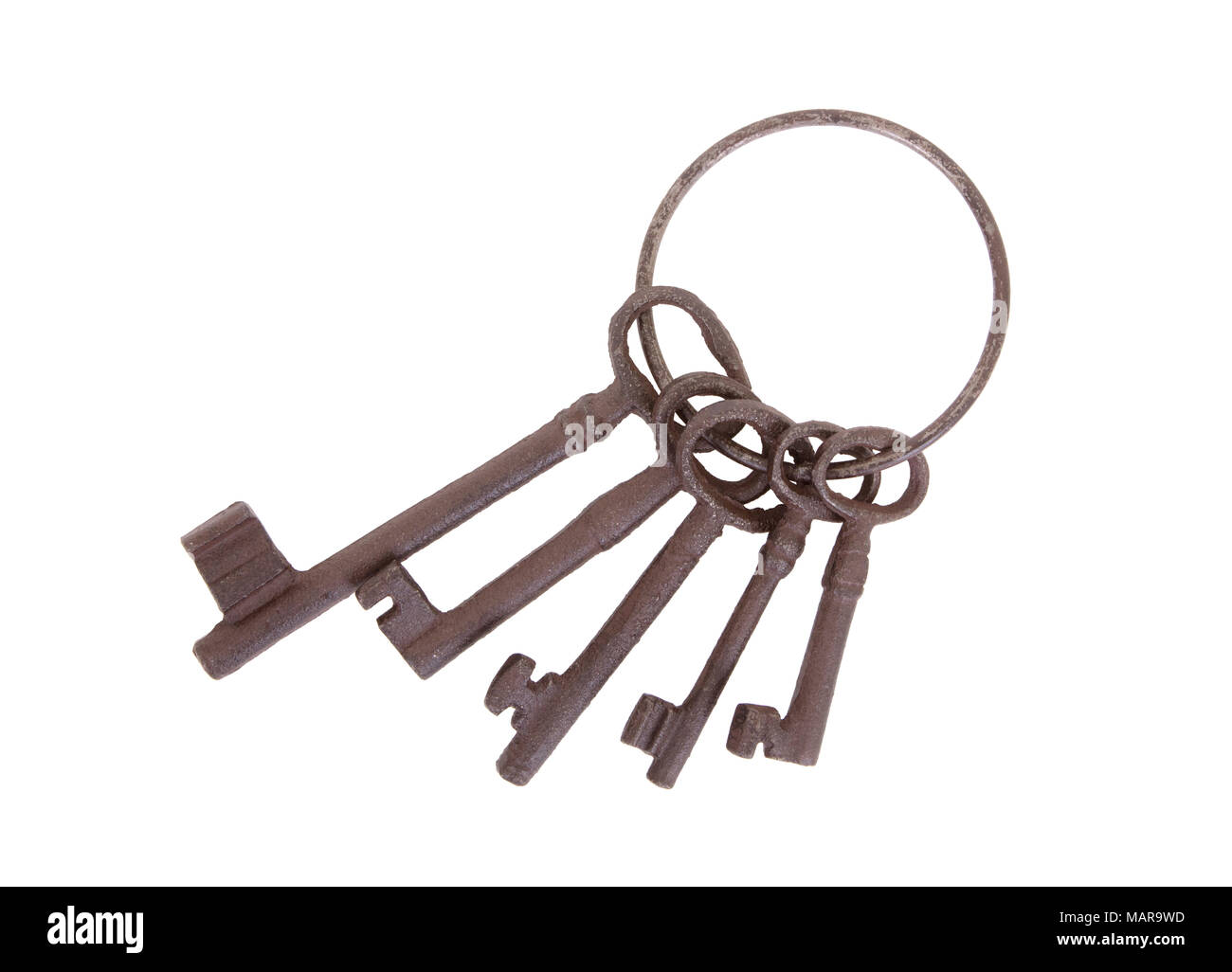 Antique keys on a ring on a white background Stock Photo - Alamy