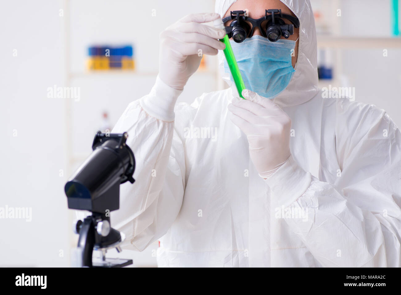 Chemist working on cannabis extract for medical purposes Stock Photo ...