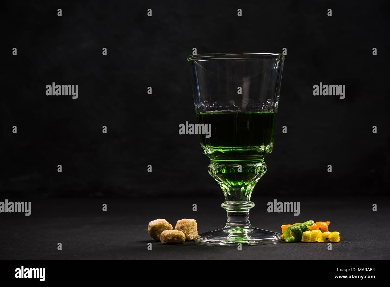 Green Absinthe in crystal glass Stock Photo - Alamy
