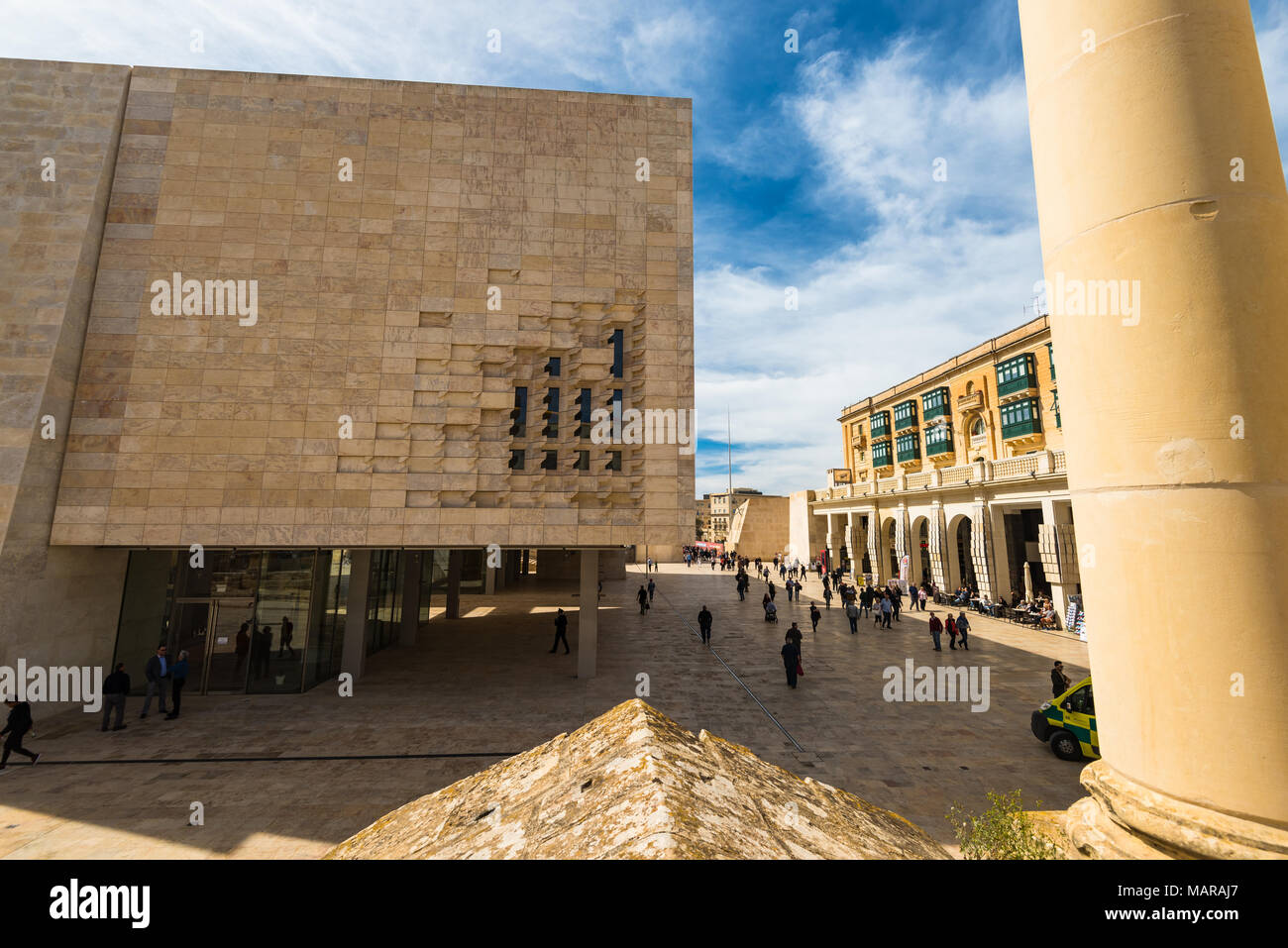 VALLETTA, MALTA - MARCH , 2018: People walking past Valletta Parliament ...