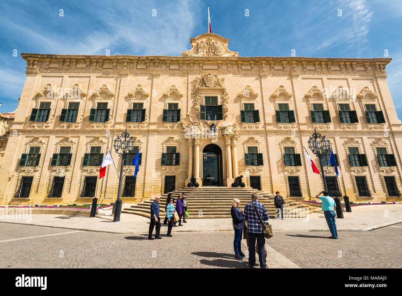 VALLETTA, MALTA - MARCH , 2018: Tourists sightseeing architecture in ...